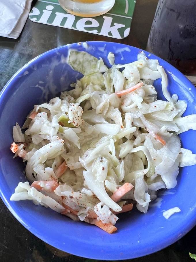 Coleslaw that knows its role&mdash;not just a side dish, but a palate-refreshing counterpoint to rich seafood that deserves its own moment in the spotlight.