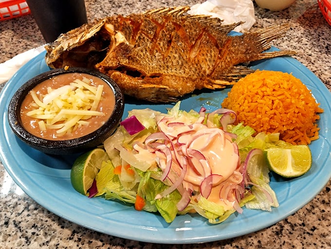 Whole fried fish staring back at you? That's not awkward&mdash;that's authentic. The crispy exterior gives way to perfectly flaky meat.