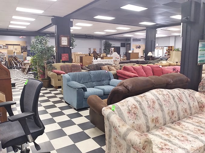 A checkerboard floor leads visitors through a sofa showroom that rivals furniture stores, minus the pushy salespeople and financing paperwork.
