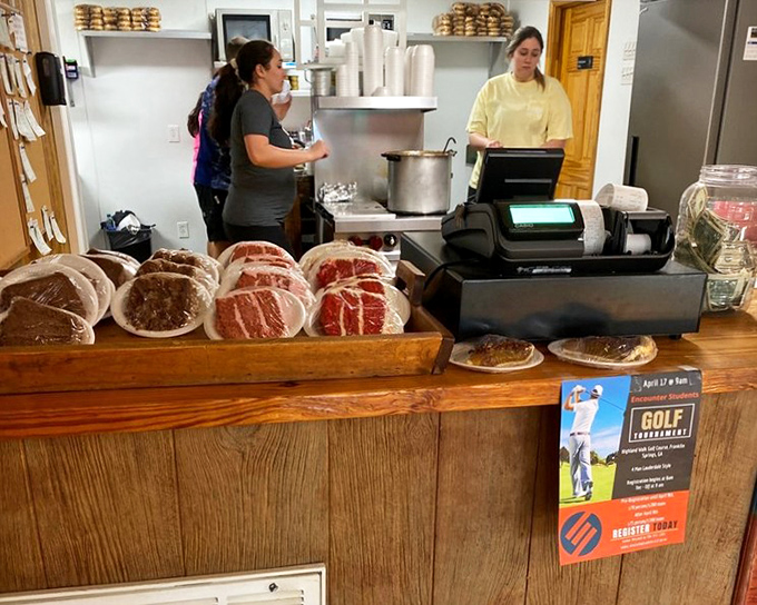 Behind every great barbecue joint is a counter where magic happens—fresh-cut meats awaiting their smoky transformation into edible art.