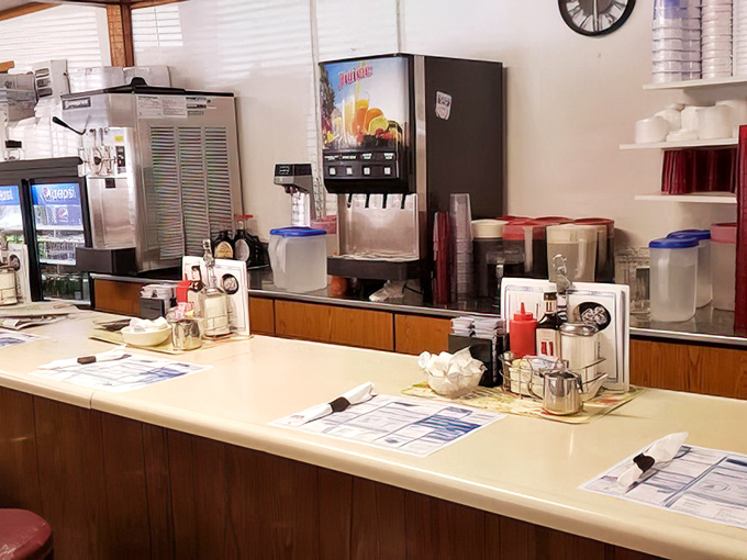 The counter—where solo diners find community, regulars have "their spot," and servers perform the daily ballet of plates and pleasantries.