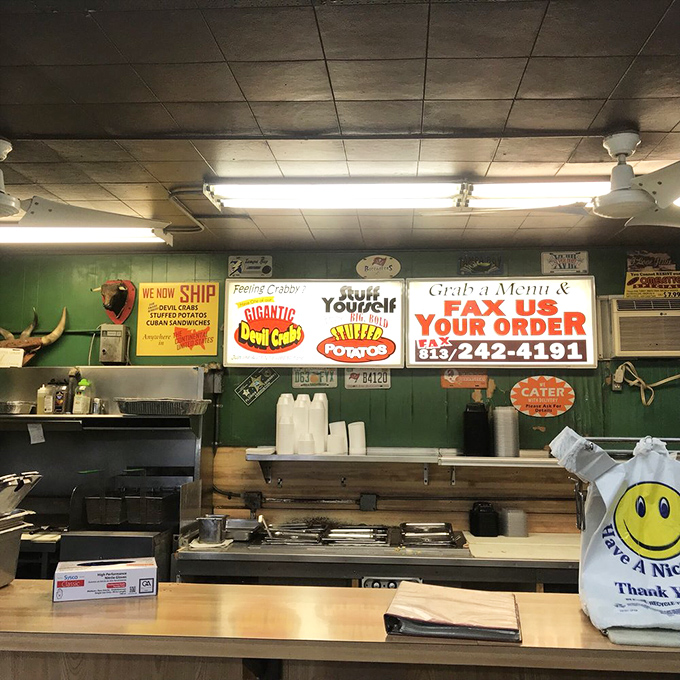 The ordering counter&mdash;where dreams become reality and decisions matter. The signs above promise delights that have kept customers returning since 1948.