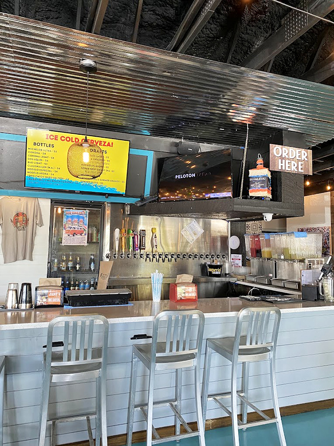 The bar where vacation mode officially begins. Those taps aren't just dispensing beer&mdash;they're pouring liquid sunshine to accompany your seafood feast.