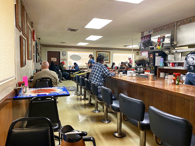 The counter seating&mdash;where solo diners become regulars and regulars become family. Some of life's best conversations happen on these swivel chairs.