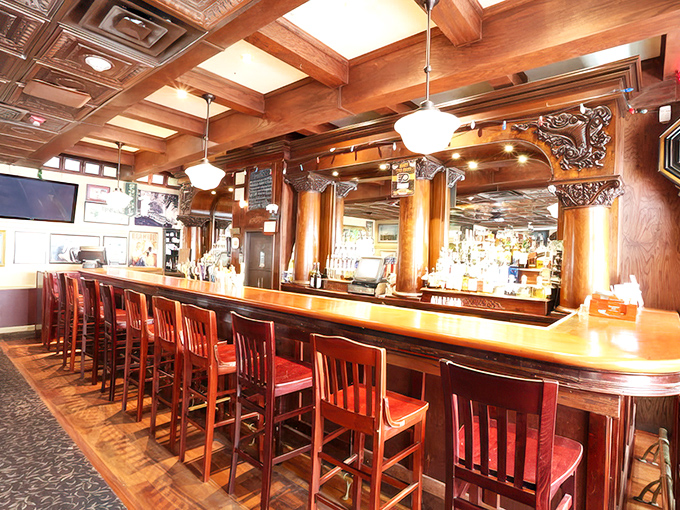 The bar where history is served on tap, with polished wood that's absorbed enough stories to fill the Liberty Bell a hundred times over.