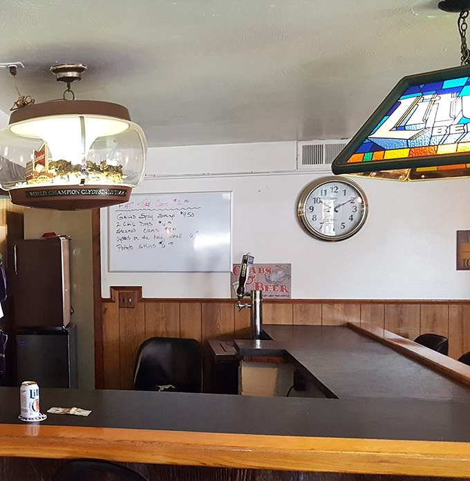 The nautical-themed bar area feels like the captain's quarters of a working fishing vessel—functional, welcoming, and ready to serve.