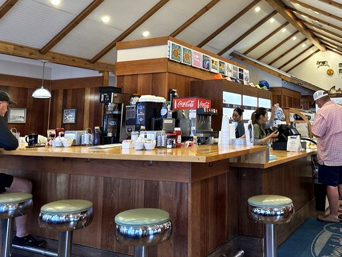 The counter where magic happens&mdash;classic diner seating with a view of the action. Those chrome stools have supported generations of hungry patrons.