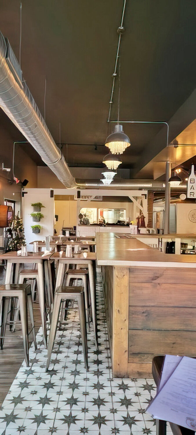 The heart of the operation where craft beer magic happens, visible to diners who appreciate transparency in their brewing process.