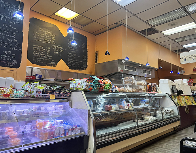The counter setup is command central for sandwich operations&mdash;where coffee brews and register keys click in harmonious rhythm.