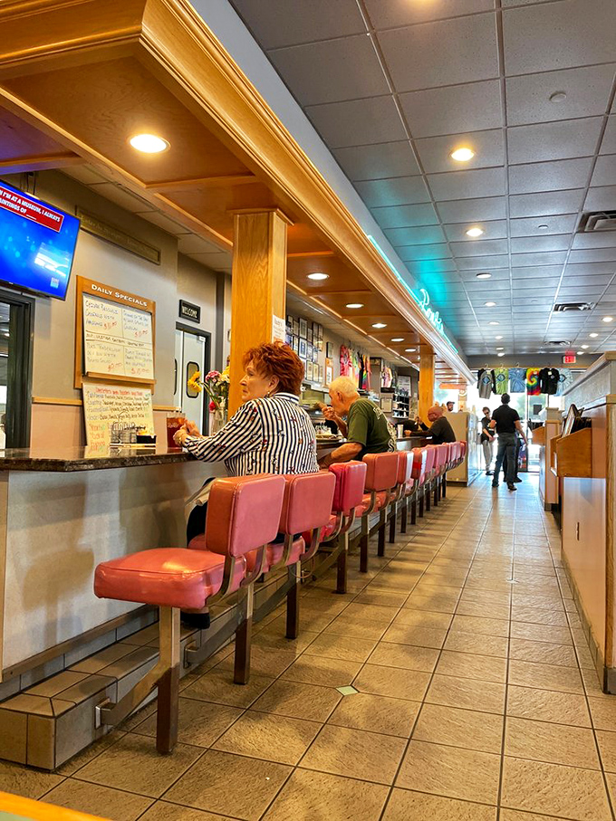 Counter seating: where solo diners become temporary neighbors and the coffee refills arrive before you even think to ask.