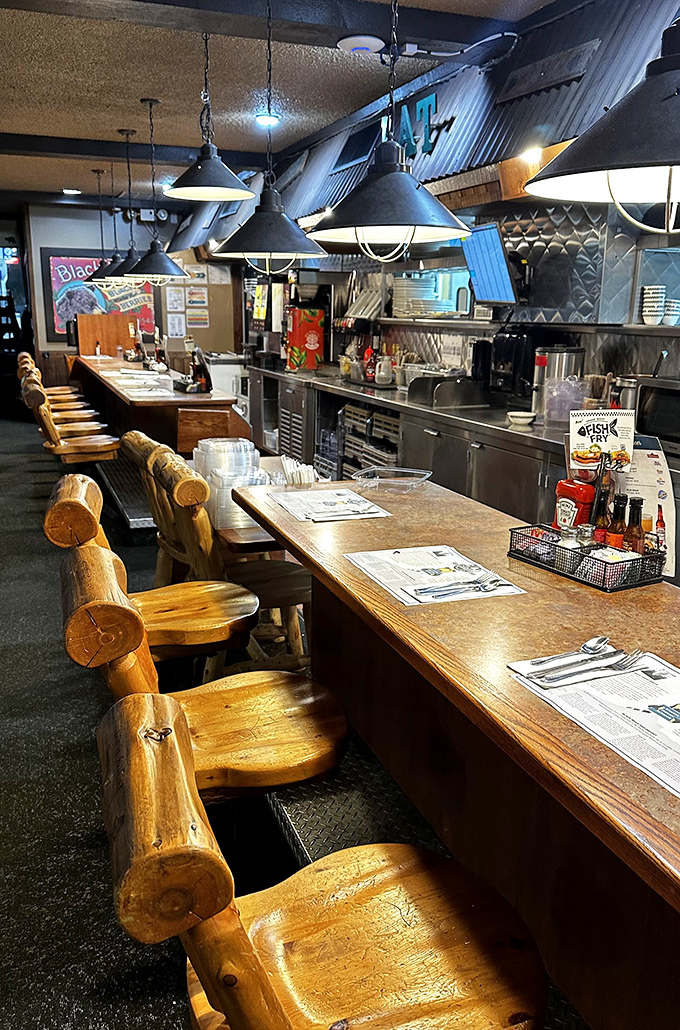 The counter seating—where solo diners become temporary members of the breakfast club, bonding over coffee refills and pancake envy.