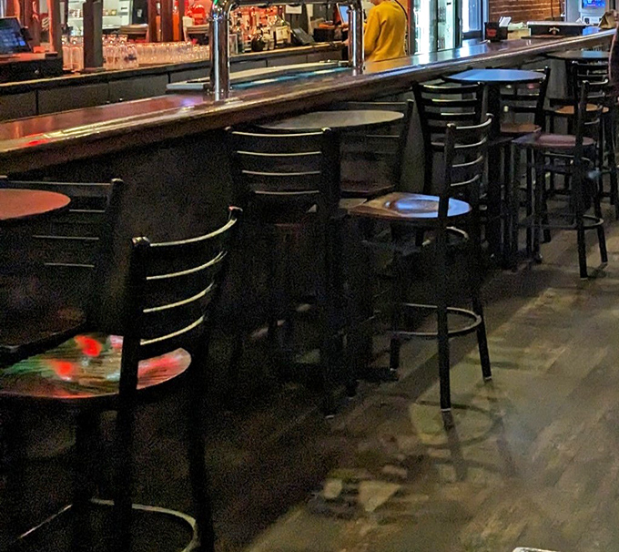 Bar stools waiting for stories to be told. The kind of place where strangers become friends over the universal language of "one more round."