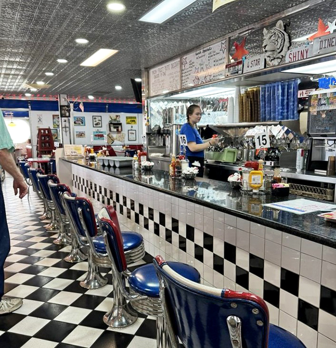 The counter seats&mdash;front-row tickets to the greatest show in town, where short-order cooks perform culinary ballet with spatulas as their batons.