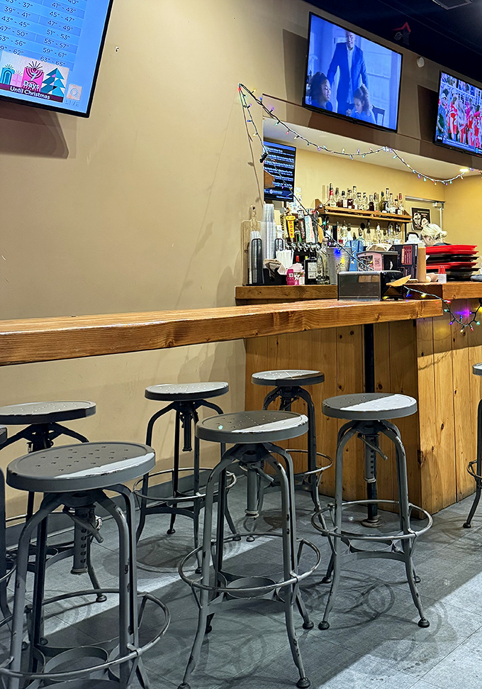 Industrial-chic bar seating that says, "Yes, we're serious about our drinks" and "Yes, you should stay for another round."