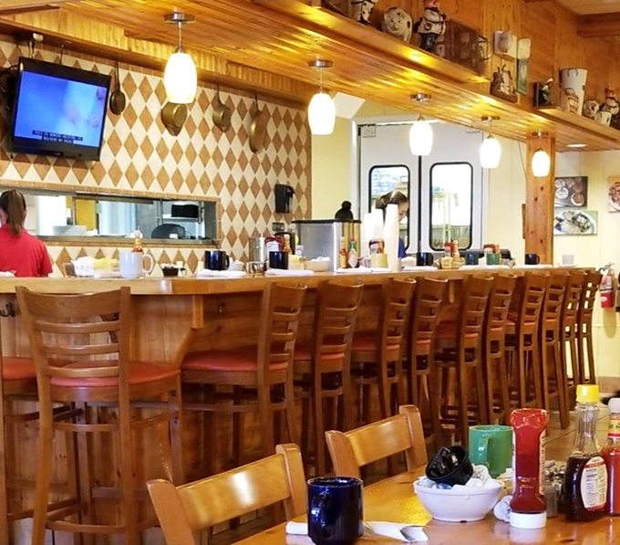 Counter seating: where breakfast enthusiasts gather like sports fans at a stadium, cheering on their favorite meal of the day.