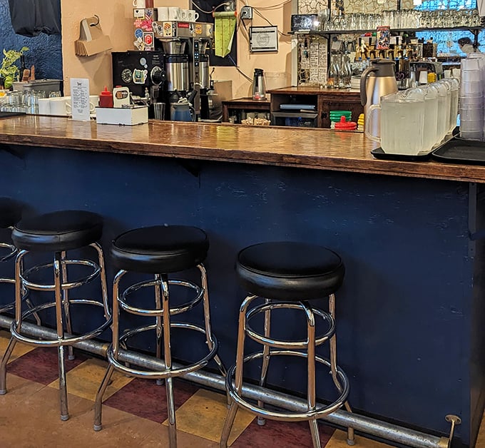 The bar seating area: where solo diners become breakfast philosophers, contemplating life's great mysteries over unlimited coffee refills.