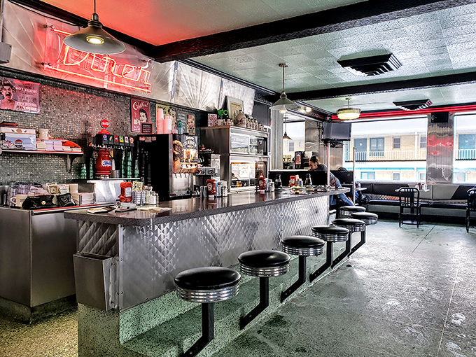 Counter seating where conversations flow as freely as the coffee and everyone becomes a temporary neighbor.