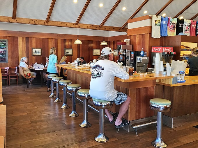 Counter seating: where solo diners become temporary members of the Donut Hole family. Those swivel stools have stories to tell.