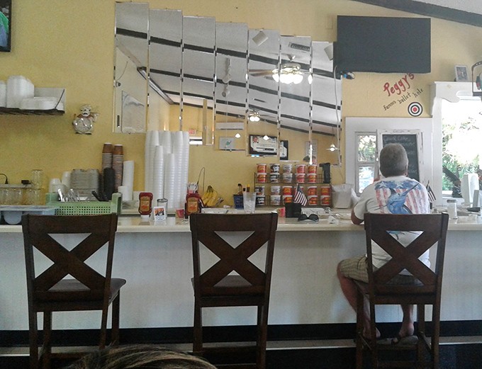 Counter seating: where solo diners become regulars and the coffee cup is always at least half full.