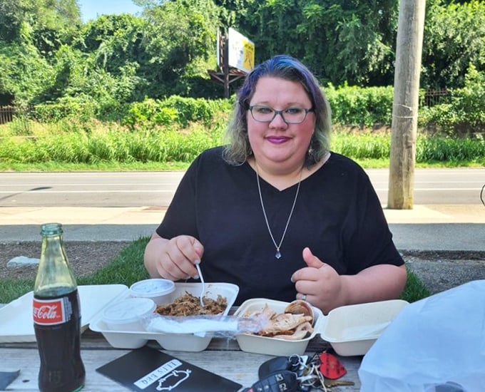 Good barbecue creates a universal language of satisfaction. That thumbs-up isn't just approval&mdash;it's the international sign for "I've found my happy place."