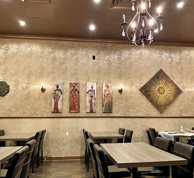 Art that transports you before the food even arrives. These elegant wall pieces set the stage for the cultural journey your taste buds are about to take.