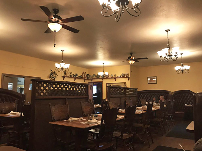 The dining room's warm glow feels like dinner at a friend's house—if your friend happened to be an exceptional chef with impeccable taste.