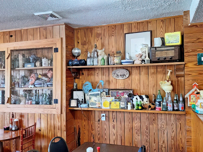 Vintage collectibles line the shelves, creating that "I'm eating in a Southern time capsule" atmosphere that enhances every bite.