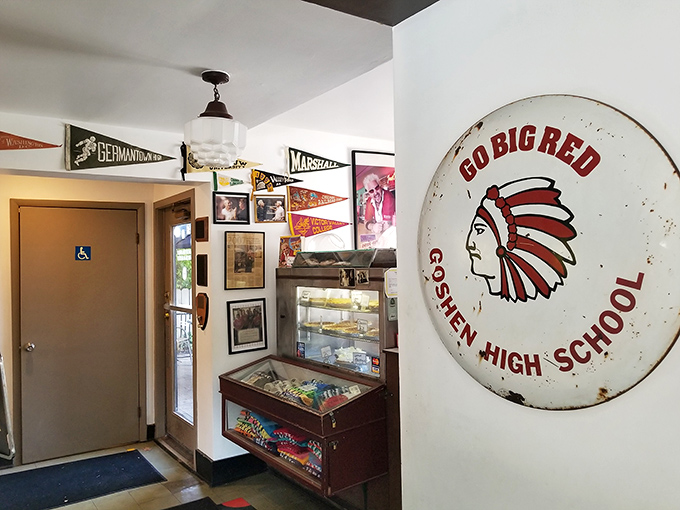 Wall decor that's part museum, part family album&mdash;every sign and photo earned its spot on these walls.