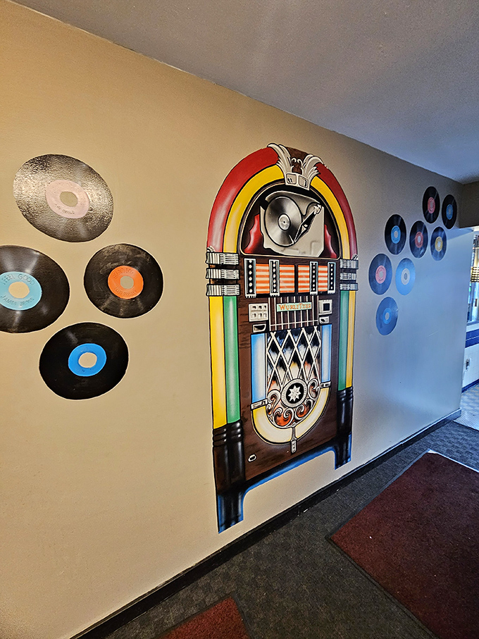 The wall of vinyl records and jukebox mural isn't just decoration&mdash;it's a time machine to when music came with your meatloaf.