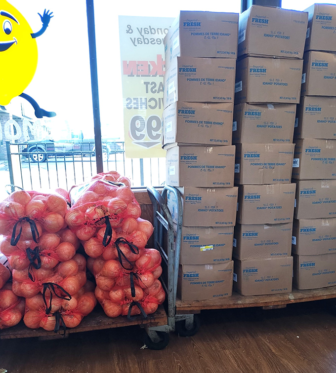 Fresh ingredients stacked high like a promise. Those bags of potatoes and onions aren't just supplies &ndash; they're potential.