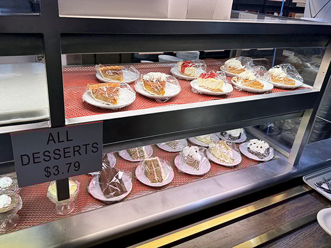 The dessert case beckons like a sweet siren, promising the perfect finale to your meal.