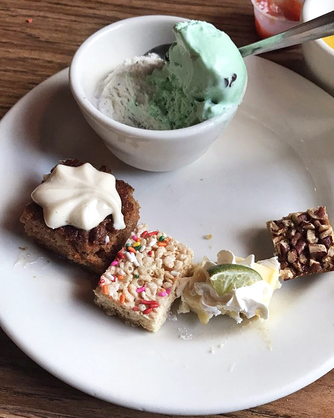 The dessert sampler with mint ice cream proves that even after a seafood marathon, there's always a separate stomach for sweets.