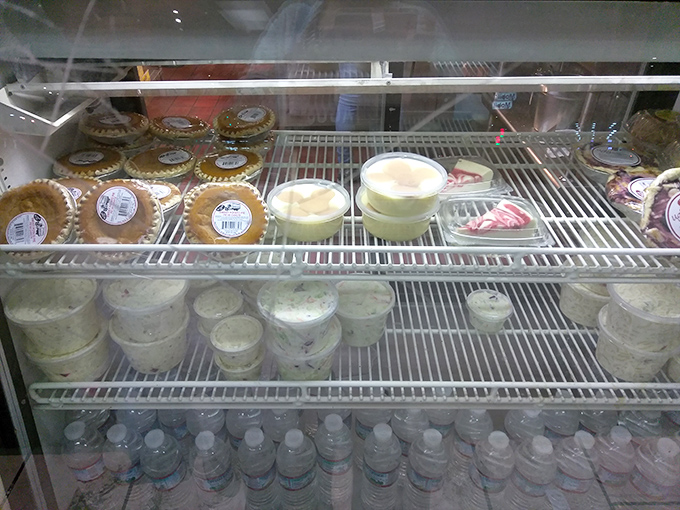 The dessert case: where banana pudding and peach cobbler wait patiently to complete your comfort food journey.
