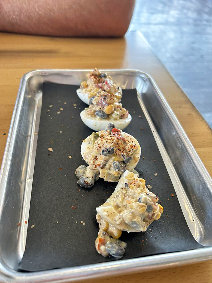 Deviled eggs, that retro appetizer staple, get a sophisticated makeover with smoky additions. Cocktail party meets backyard barbecue.