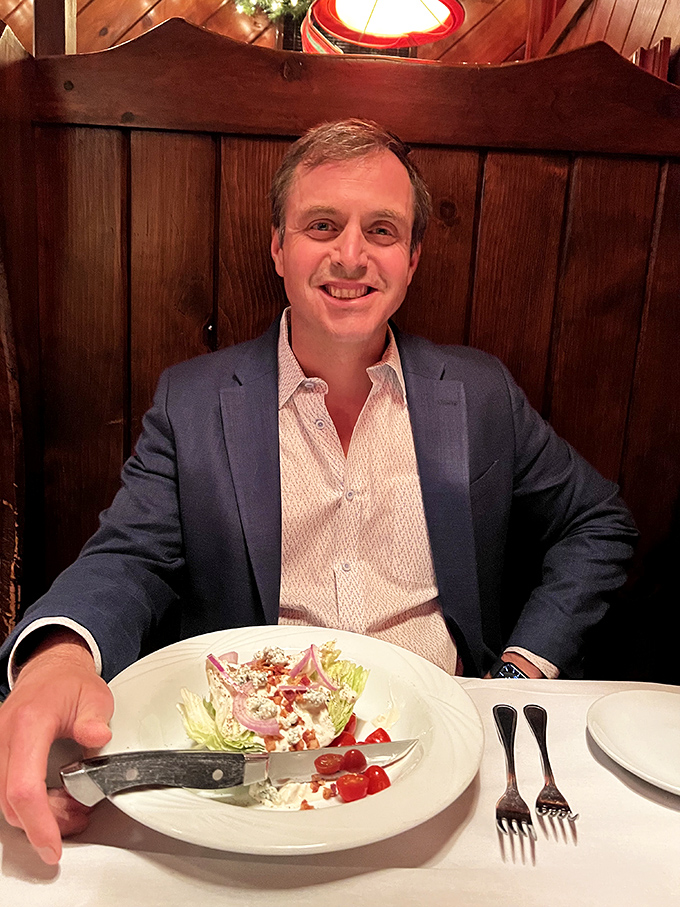 The dining room captures that moment when you realize you're sitting in one of those wooden booths where memories are made and diets are forgotten.