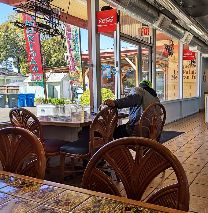 Morning light bathes the dining room in possibility. Those tables have witnessed first dates, family gatherings, and solo diners finding comfort in perfect bites.