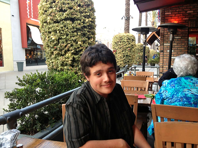 Happy diners discovering that sharing small plates creates big memories and satisfied smiles.