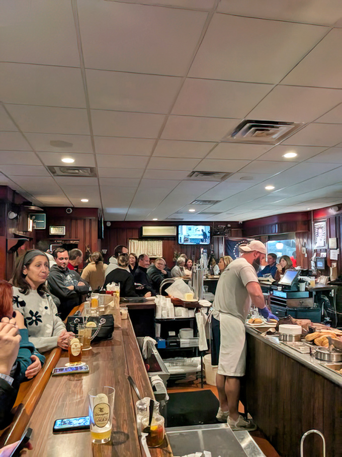 The true measure of a neighborhood spot: a bar filled with regulars who don't need to check their phones because the real entertainment is all around them.