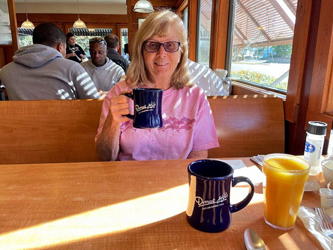 Sunlight streams through windows as diners enjoy the ritual of coffee and conversation. Some vacations are measured in calories, not miles.
