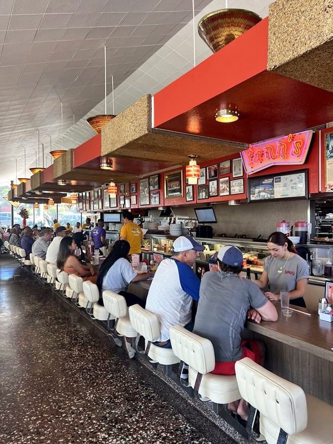 The counter at Pann's isn't just a place to eat; it's front-row seating to a short-order ballet that's been running for decades.