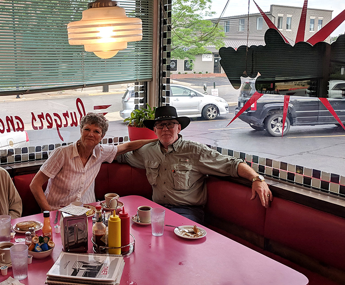 Where strangers become friends over coffee and pancakes, proving that the best conversations still happen across formica tables in cozy booths.