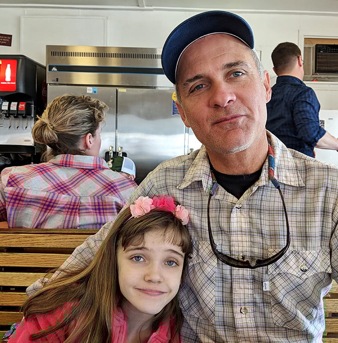 Happy diners enjoying their breakfast together &ndash; this is what community dining looks like at its finest.