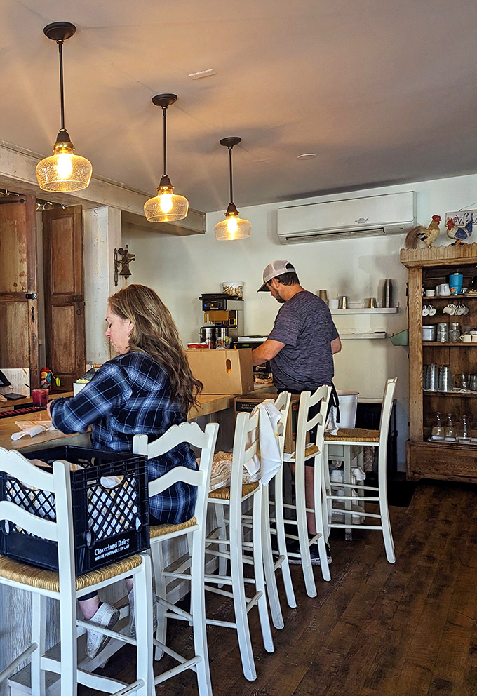 The bar seating offers a quiet corner for solo diners to enjoy their morning feast while watching the kitchen ballet.