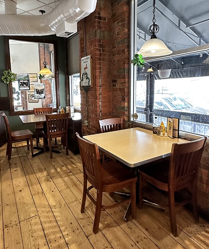 Cozy dining spaces where strangers become friends over shared plates and Cleveland sports talk.