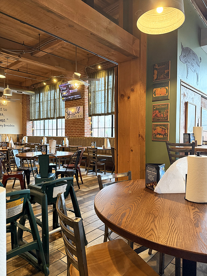 Rustic wooden beams, natural light, and tables arranged for conversation&mdash;the dining room feels like a BBQ enthusiast's living room.