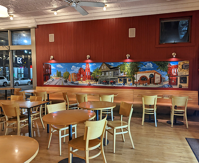 The dining area balances warmth and simplicity, with a colorful mural celebrating Little Italy&mdash;the perfect backdrop for your impending sugar rush.