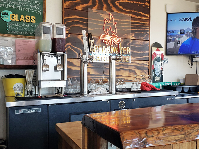 The drink station stands ready, with the Breakwater logo glowing like a beacon of hope for the thirsty and barbecue-obsessed.