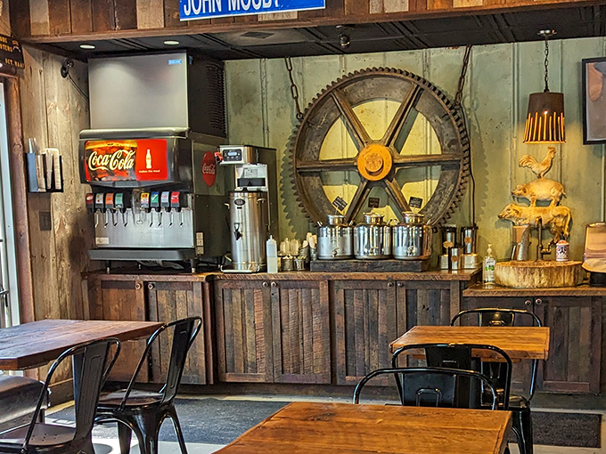The self-serve drink station stands ready like a faithful companion. That Coca-Cola machine has witnessed more food euphoria than most therapists.