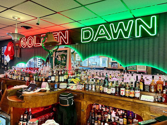 The neon glow behind the bar isn't just lighting&mdash;it's a beacon that's been guiding hungry Youngstown residents home for decades.