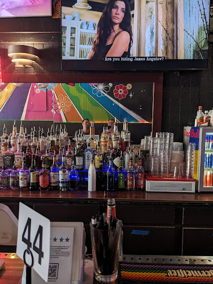 The bar's rainbow of bottles promises liquid adventures to complement your meal. Decision paralysis has never been more delightful.